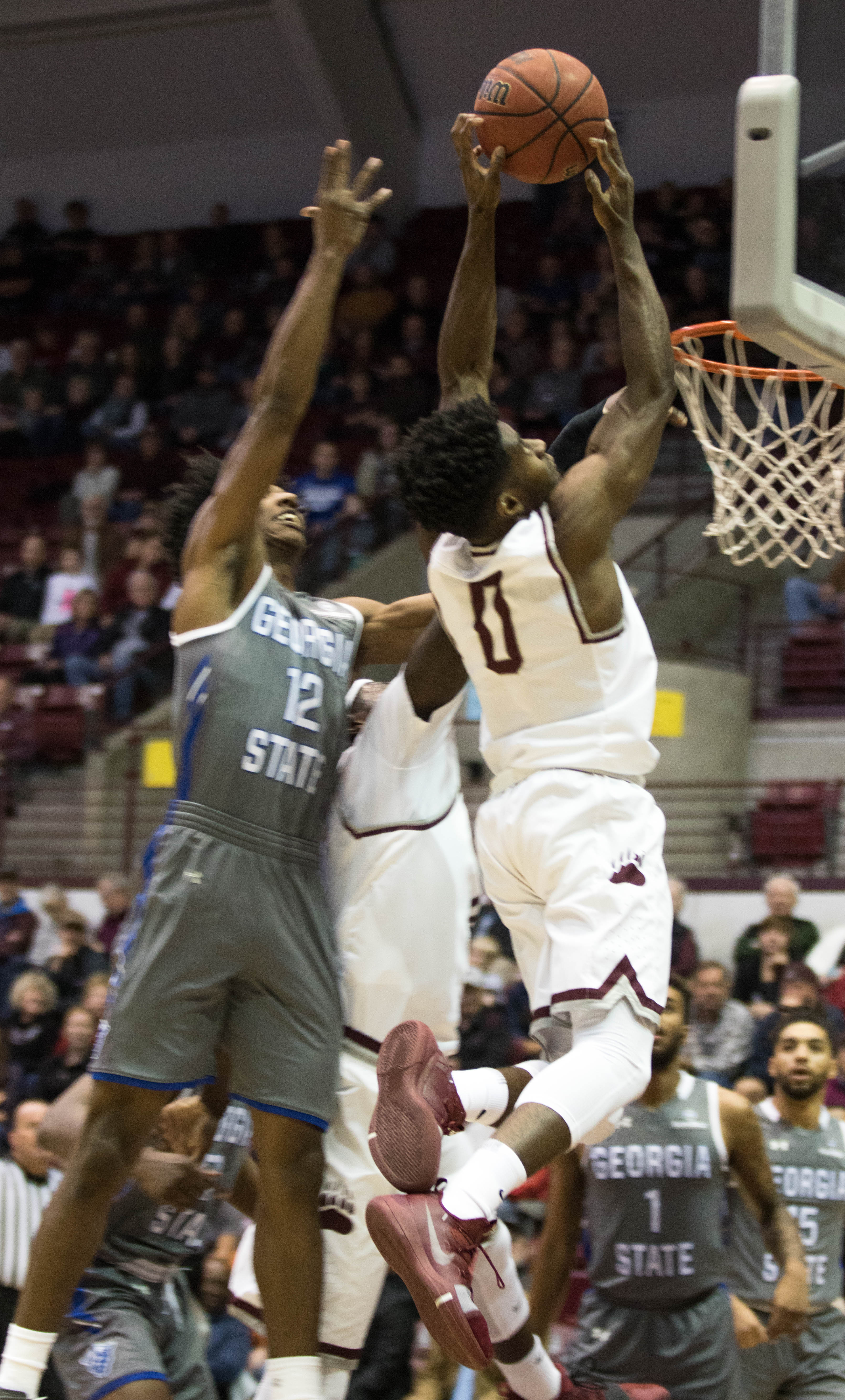 ALL IN TO WIN: Oguine sacrifices personal success, finishes a Griz ...